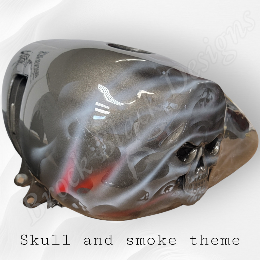3D skull stretching through with smoke tins – Brock Black Customs